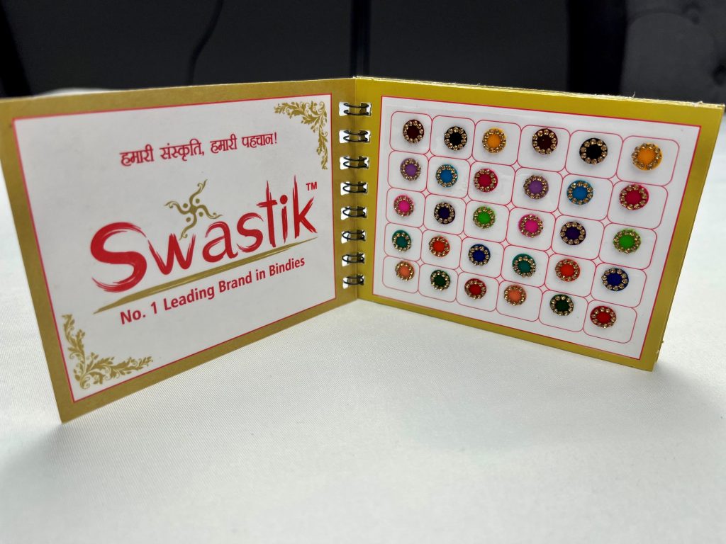 Multi-colour bindi book - Saree Hire Store